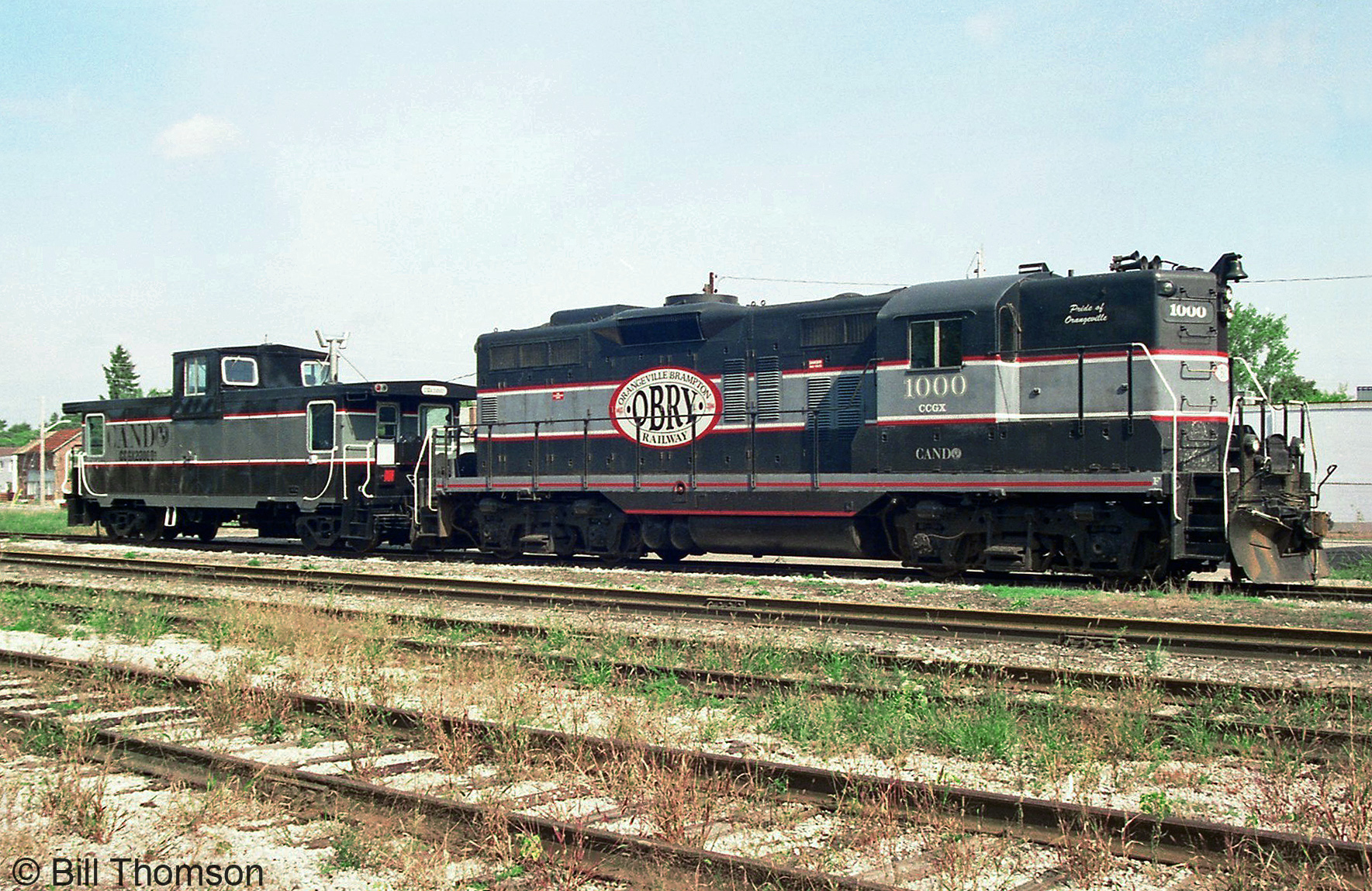 Railpictures.ca - Bill Thomson Photo: Cando Contracting’s GP9 CCGX 1000 sits with caboose 200001 ...
