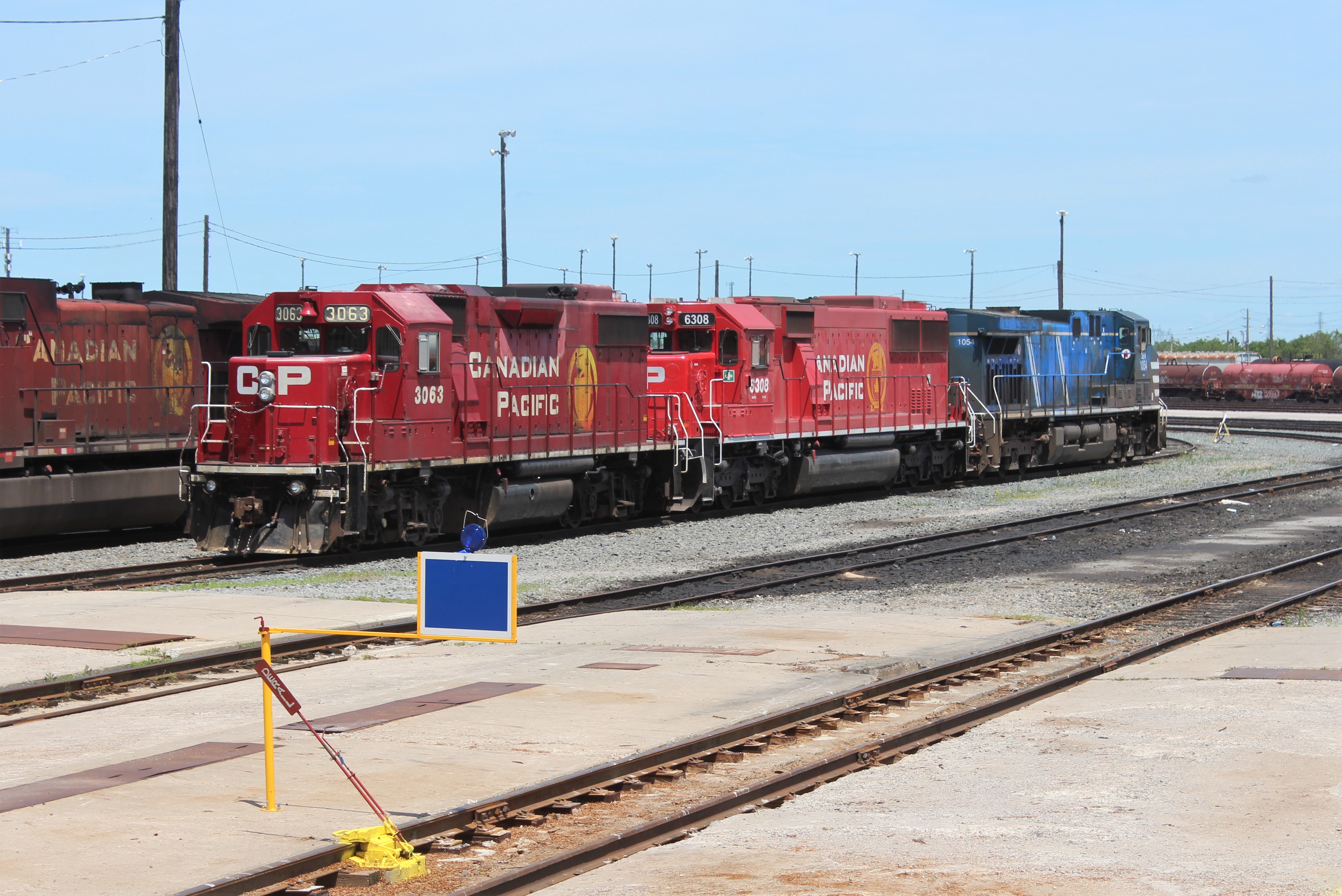 Railpictures.ca - Paul Santos Photo: On Canada Day a trio of units on track 2 east includes SD60 ...