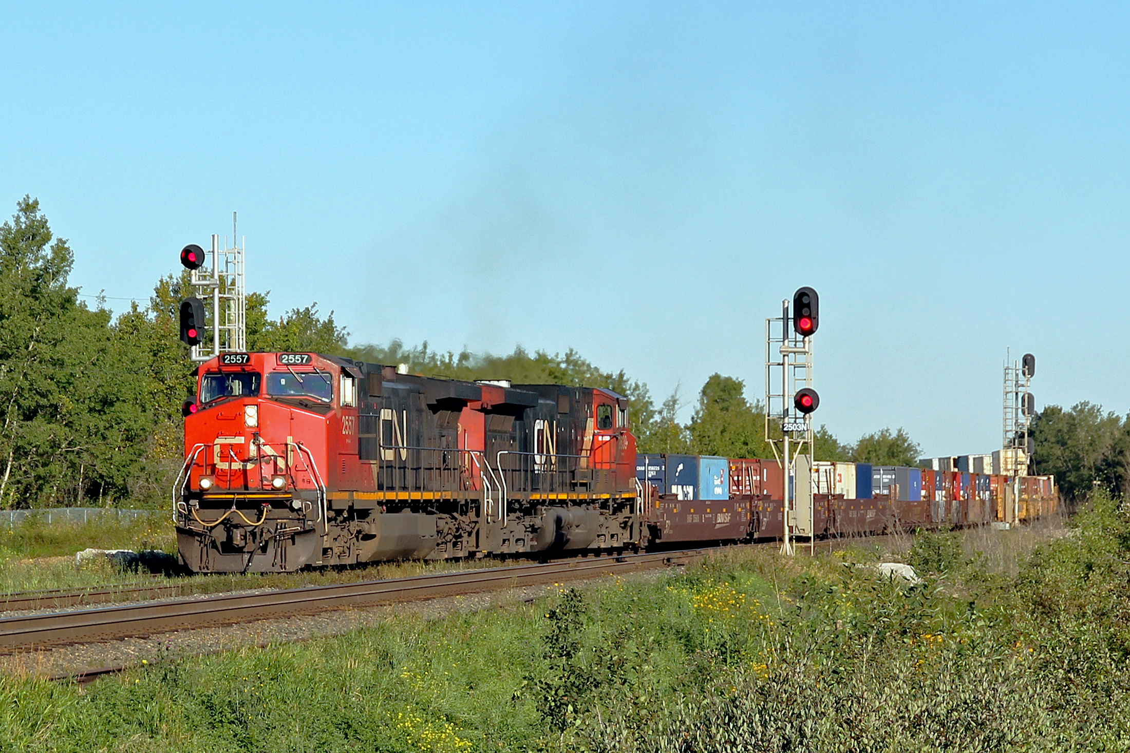 Railpictures.ca - colin arnot Photo: A pair of DASH 9-44CW’s take an eastbound intermodal onto ...