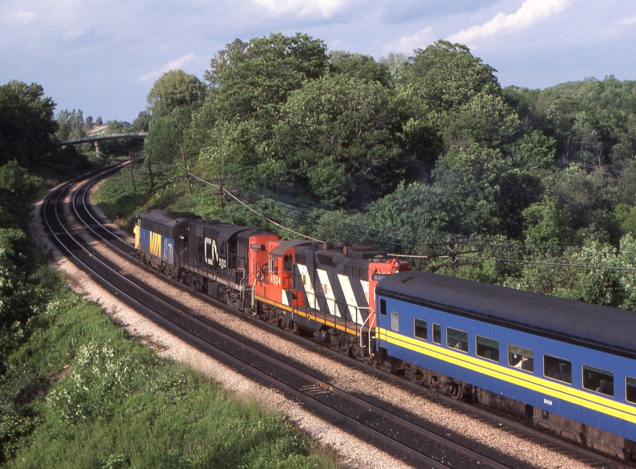 Railpictures.ca - Robert Farkas Photo: VIA 6520, CN 3103, and CN 4504 are eastbound east of ...