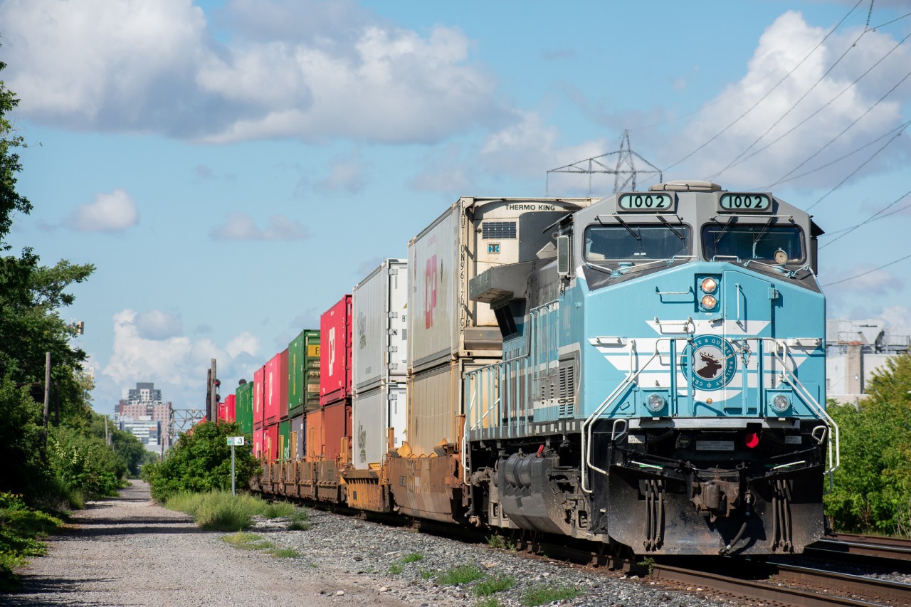 Railpictures.ca - Liam MacDougall Photo: CEFX 1002 wearing an attractive CMQ paint scheme brings ...