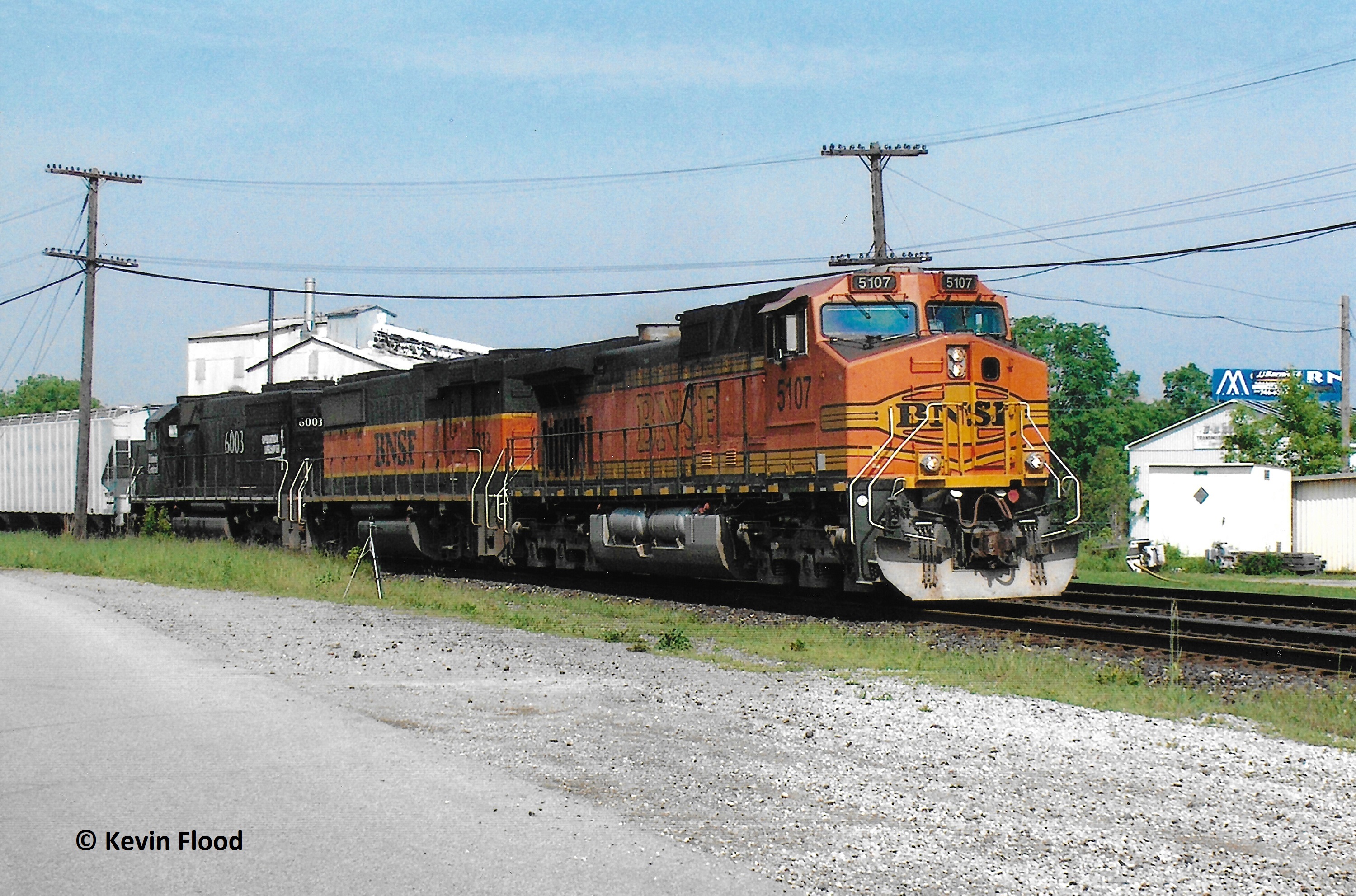 Railpictures.ca - Kevin Flood Photo: CN 394 cruises through Paris on a muggy morning with a ...