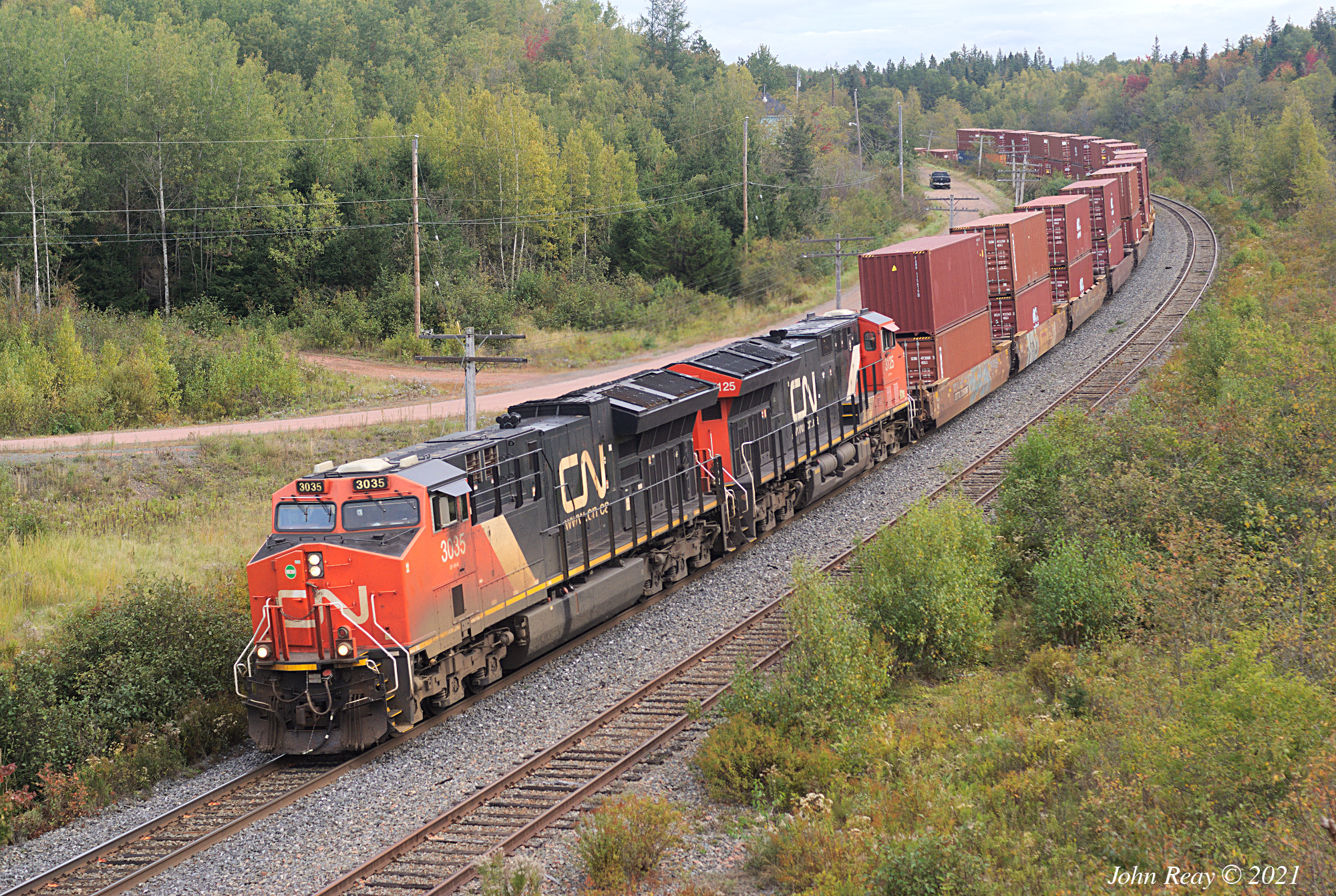 Railpictures.ca - John Reay Photo: Oct 2nd 2021 @ 10:39, Springhill Jct, Q123 with 352 axles. CN ...