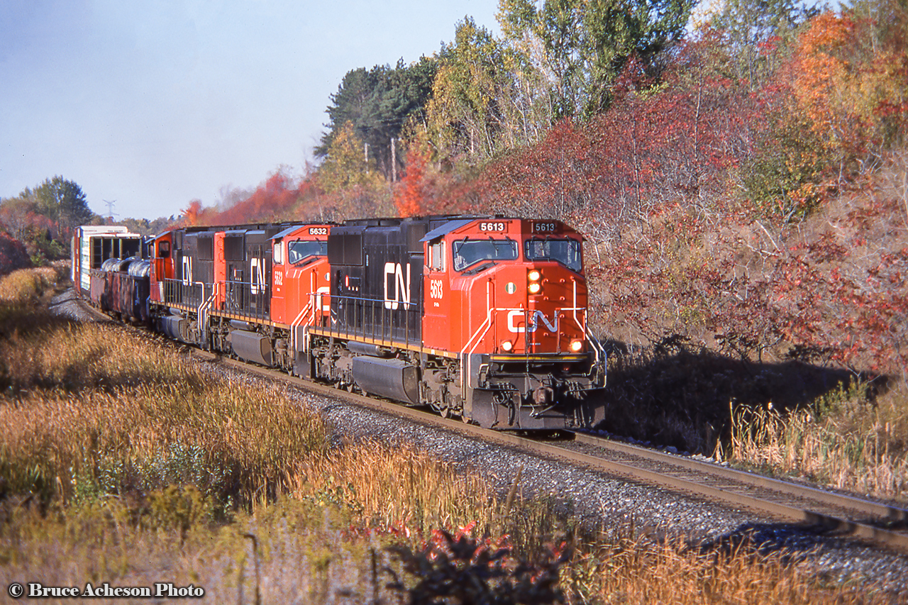 Railpictures.ca - Bruce Acheson Photo: A trio of SD75is lead west into the late afternoon fall ...