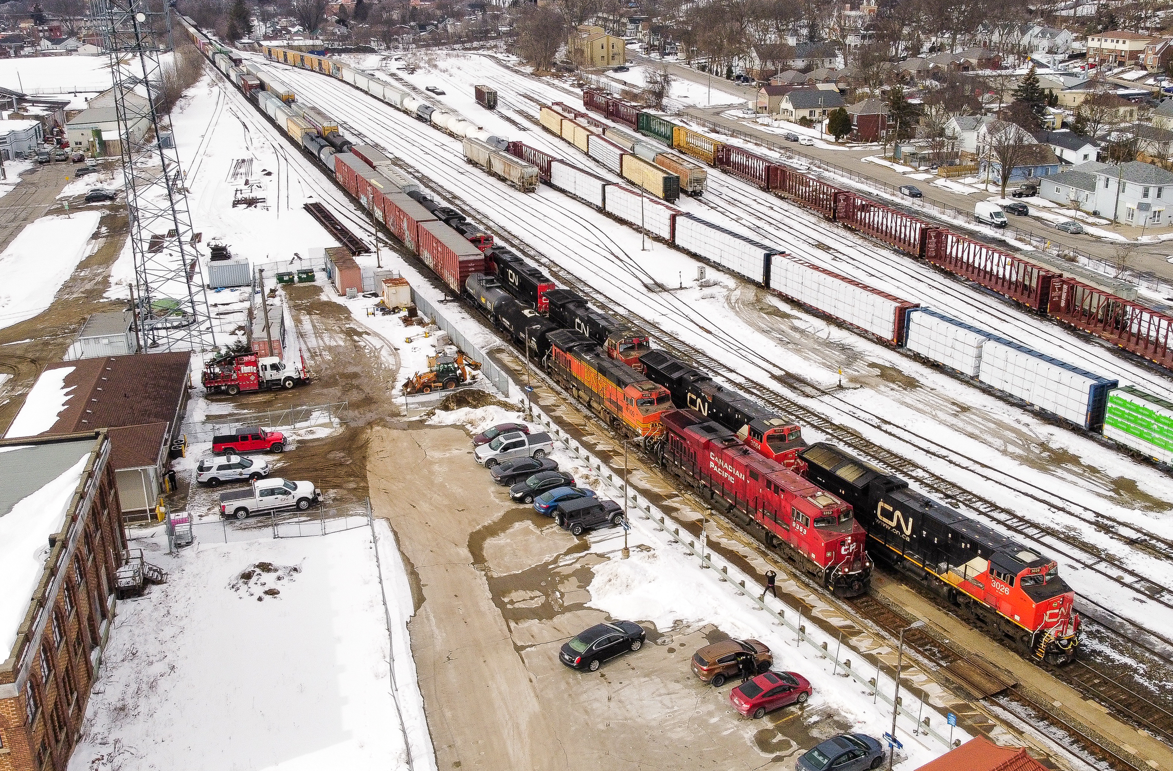 Railpictures.ca - Joseph Bishop Photo: CN X396 rolls through Brantford behind CP 9353 and BNSF ...