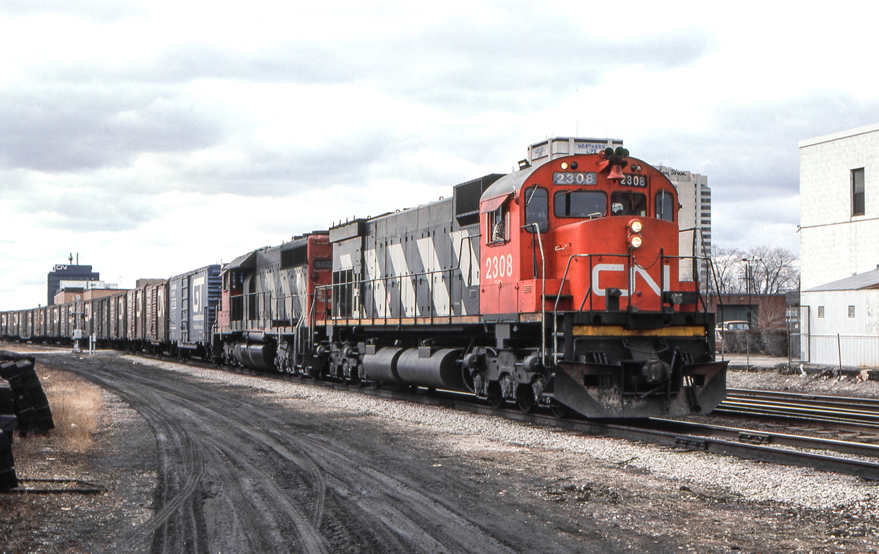 Railpictures.ca - Robert Farkas Photo: CN 2308 is eastbound in London, Ontario on March 25, 1981 ...