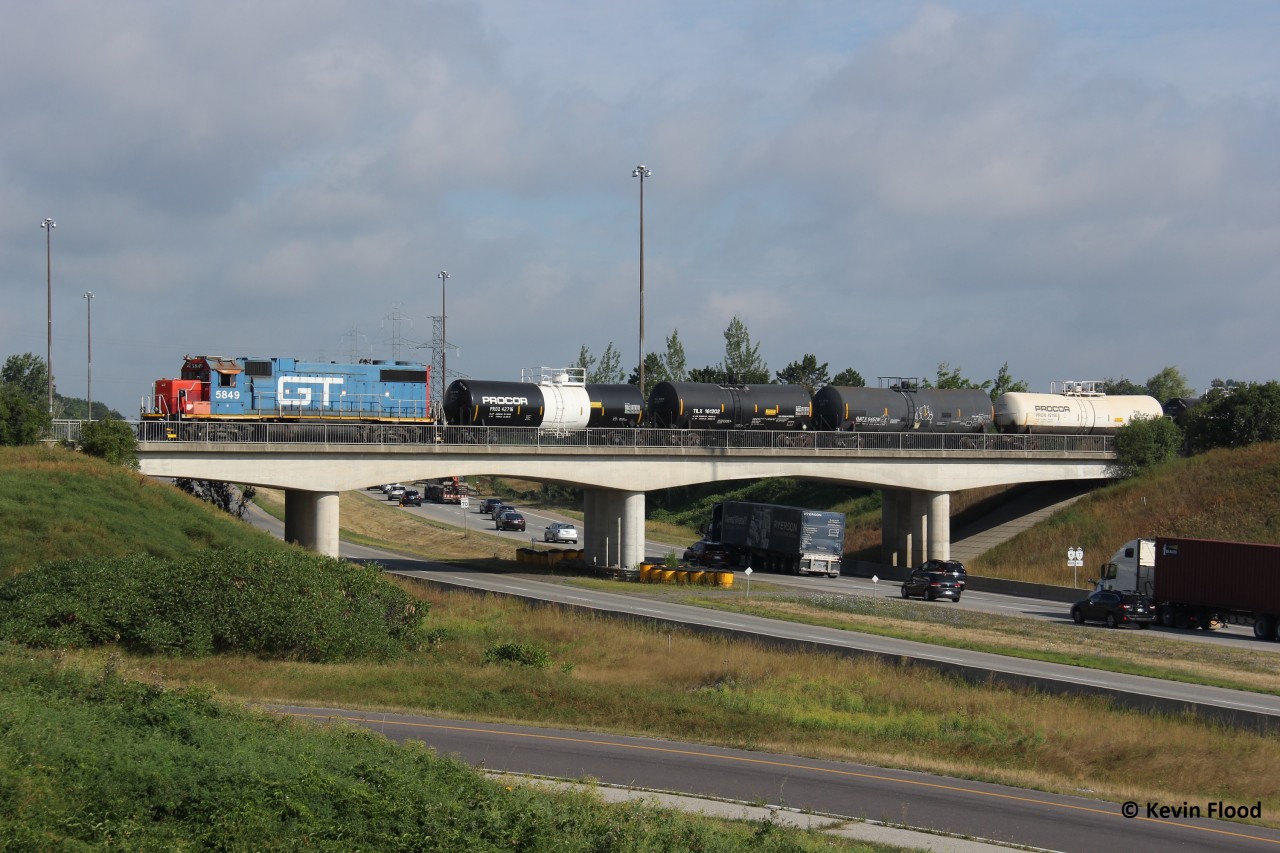 Railpictures.ca - Kevin Flood Photo: CN 542 with a solo GTW 5849 is pictured backing up over ...