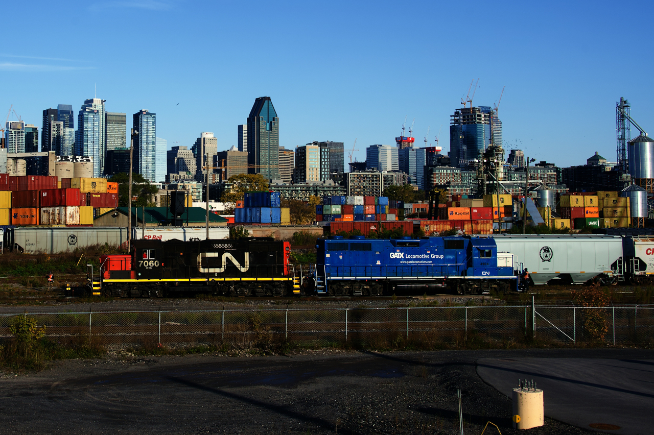 Railpictures.ca - Michael Berry Photo: CN 7060 & CN 4904 are running around a cut of grain cars ...