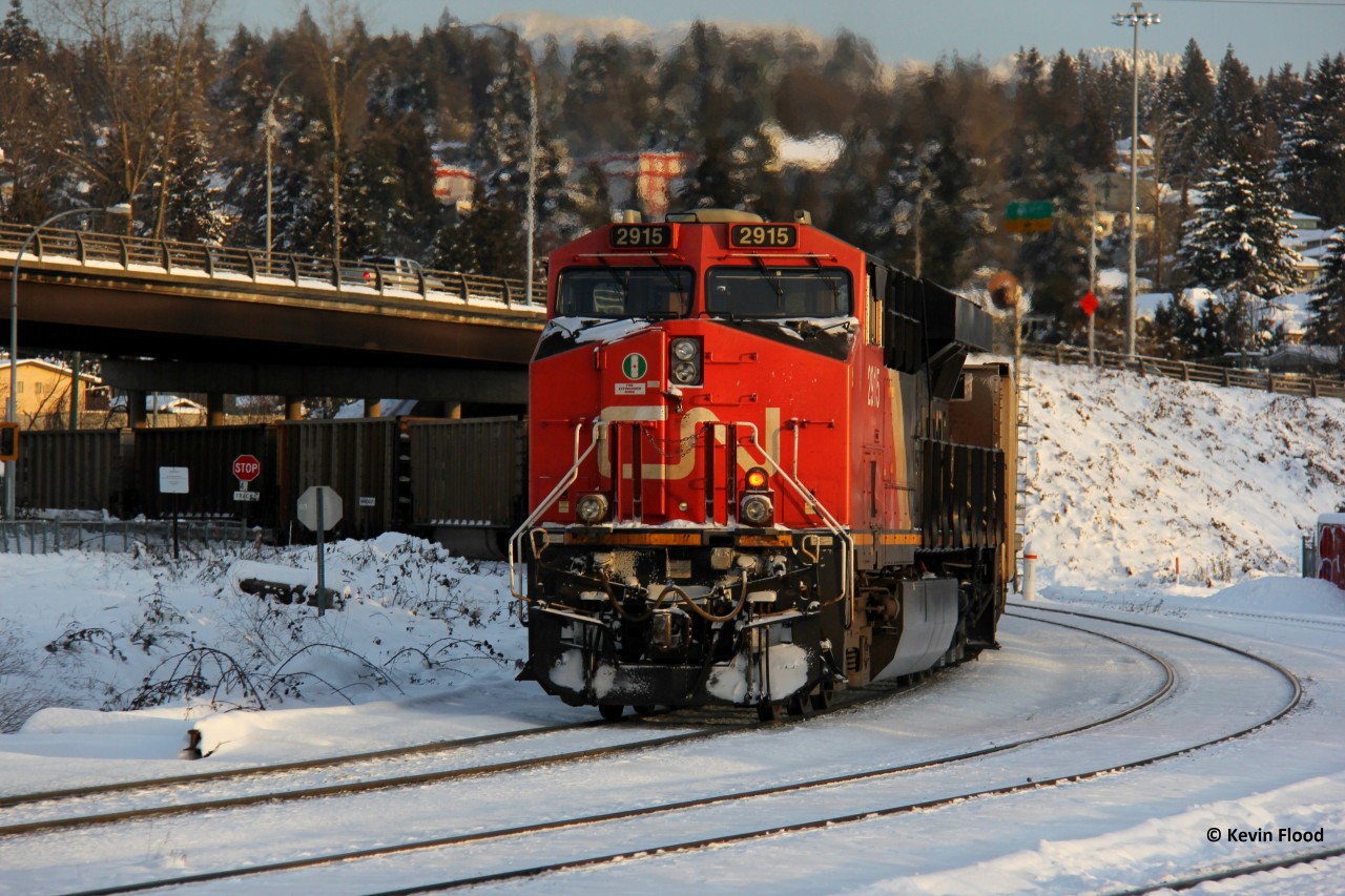 Railpictures.ca - Kevin Flood Photo: CN 2910 pushes on a coal train as it ducks under Brunette ...