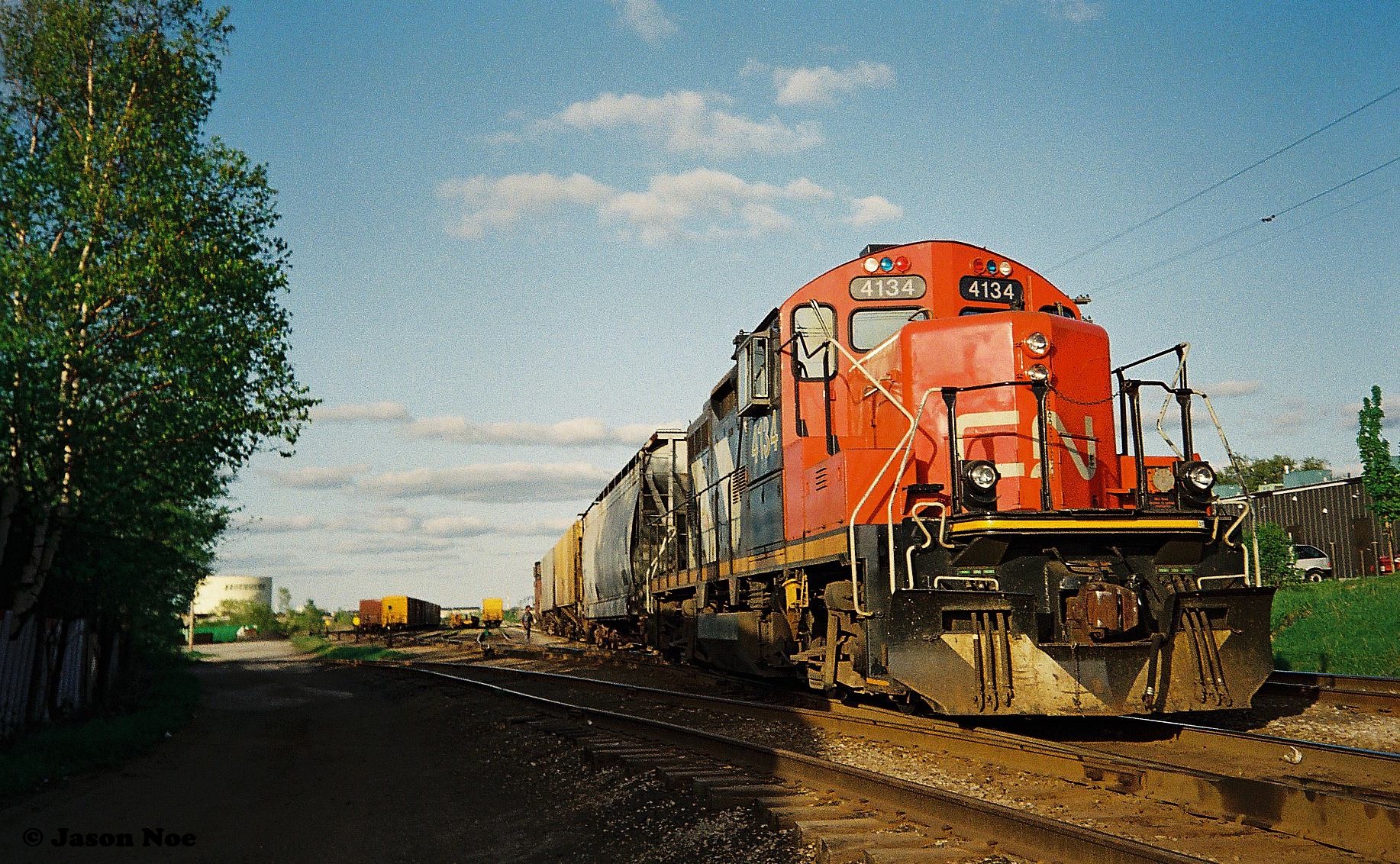 Railpictures.ca - Jason Noe Photo: With their train assembled, engineer Dennis Fleet waits to ...