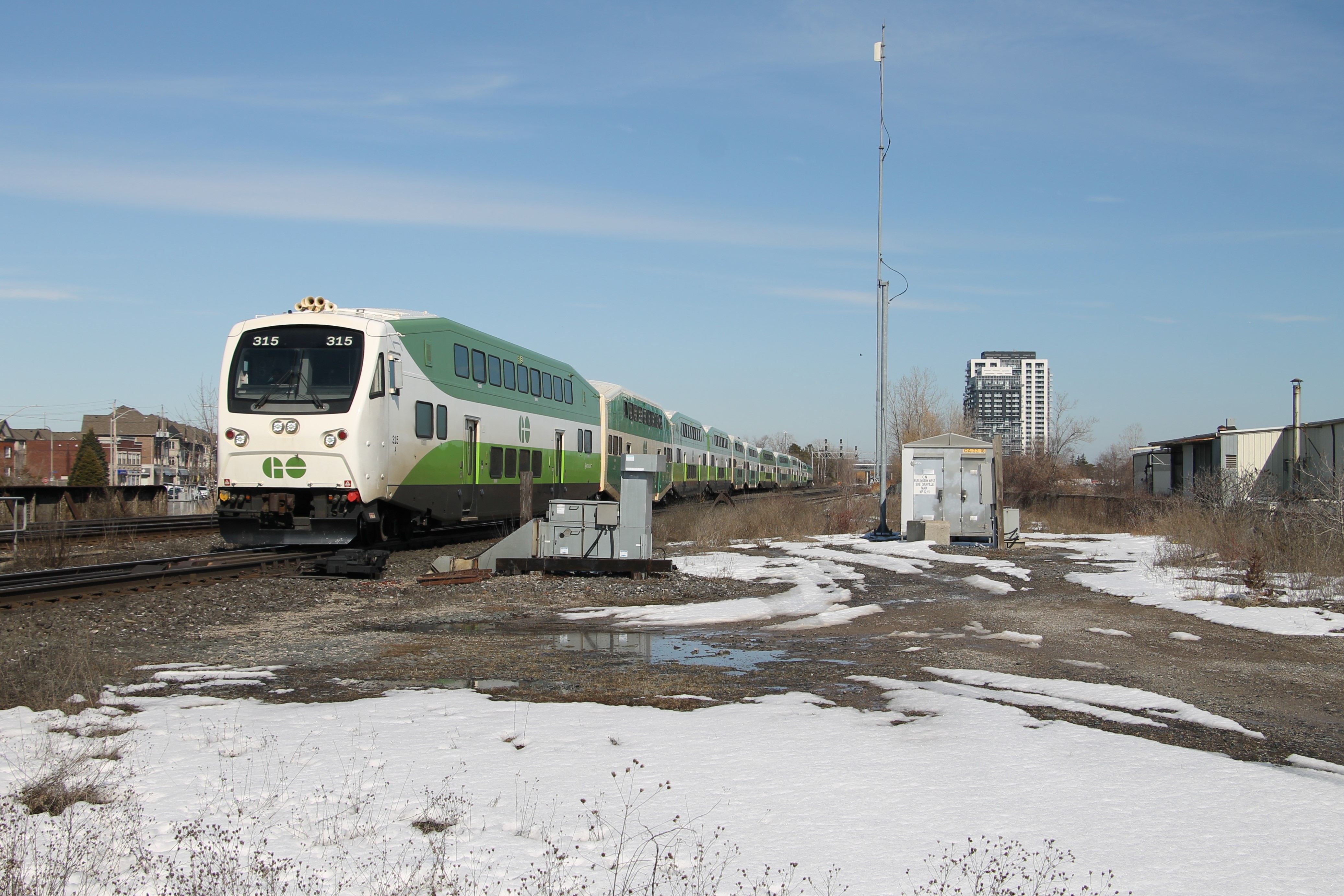 Railpictures.ca - Terry O'Shell Photo: A westbound GO with Cab Car 315 leading crosses over from ...