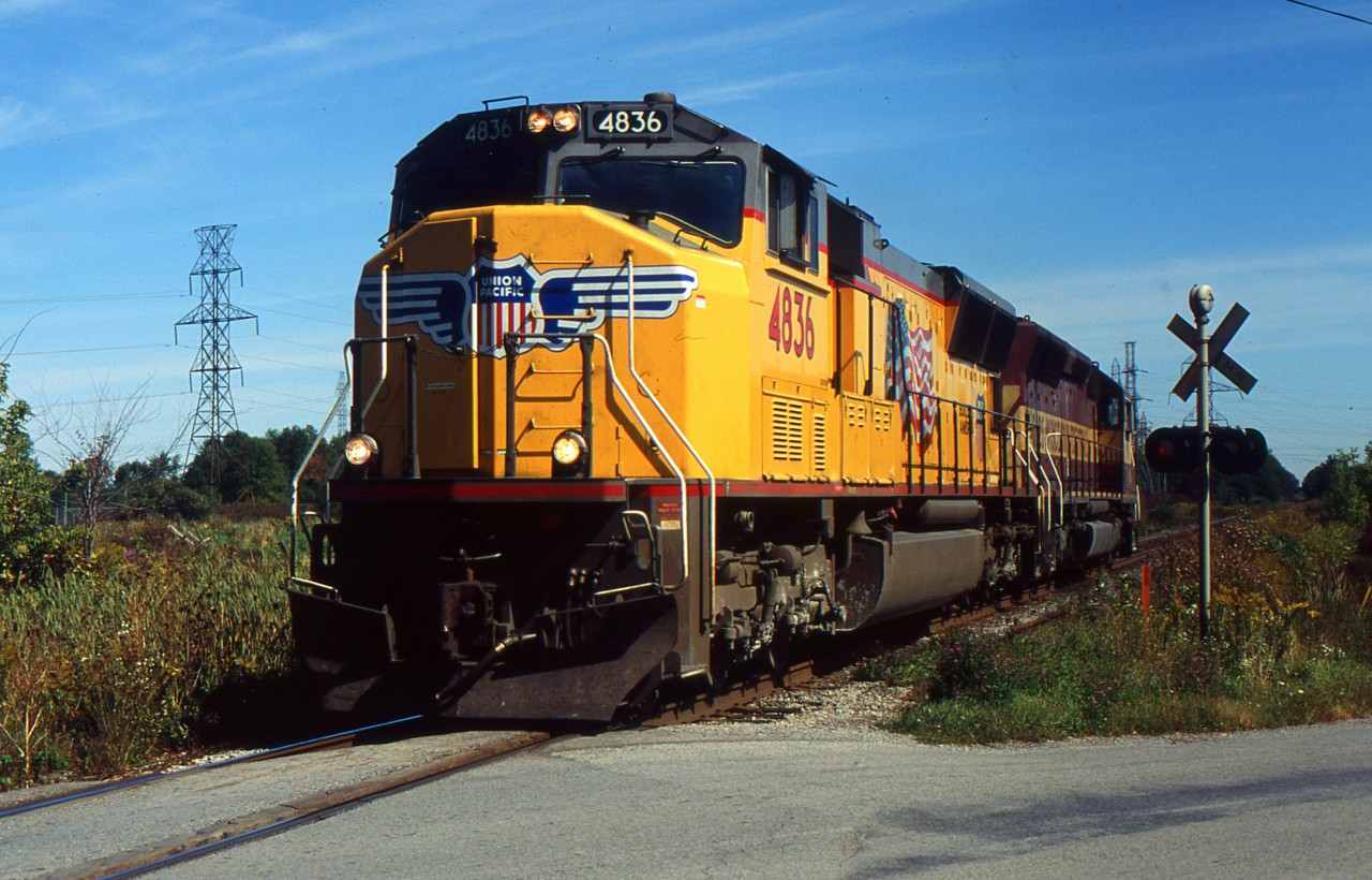 Railpictures.ca - Dean Brown Photo: NS 328 with UP 4836 and WC 6625 and 0 cars through Port ...