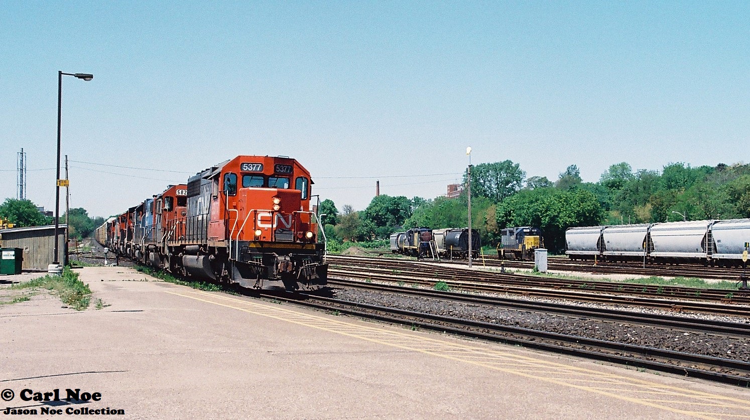 Railpictures.ca - Carl Noe (Collection of Jason Noe) Photo: During a spring afternoon, CN 384 ...