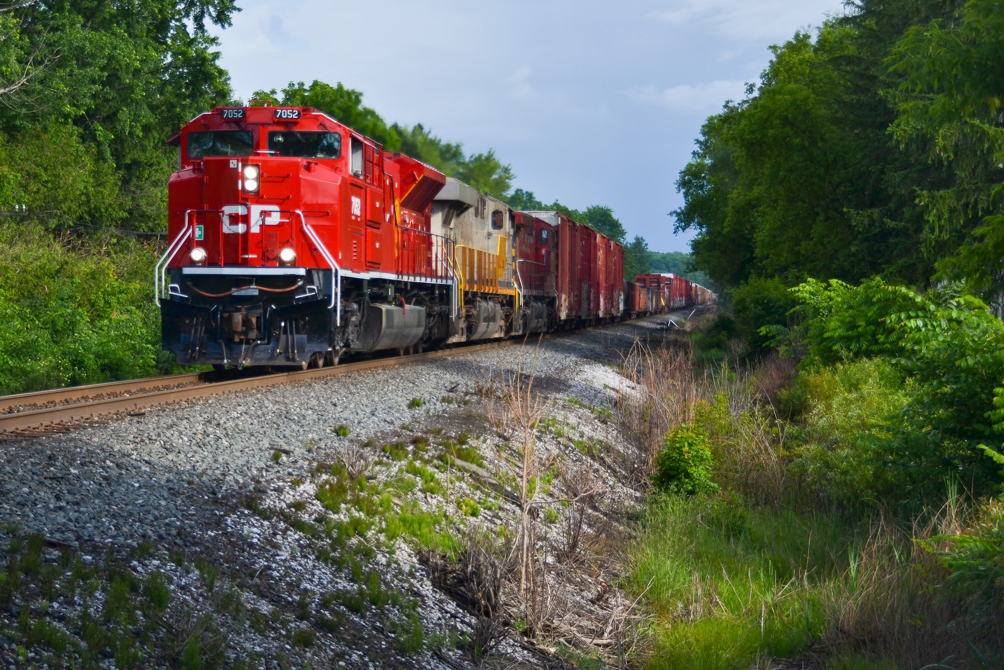 Railpictures.ca - Owen Watson Photo: Emerging from a gloomy rain shower to the south, freshly ...