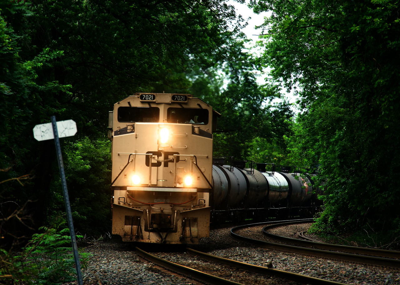 Railpictures.ca - Michael Berry Photo: CP 7021 leads ethanol train CPKC 528 as it rounds a curve ...