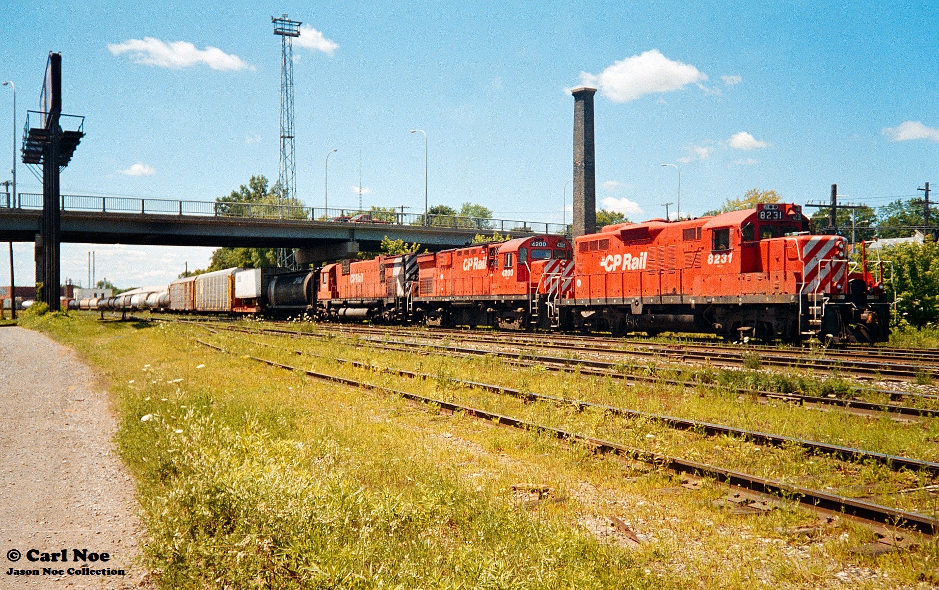 Railpictures.ca - Carl Noe (Collection of Jason Noe) Photo: A Canadian Pacific eastbound waits ...