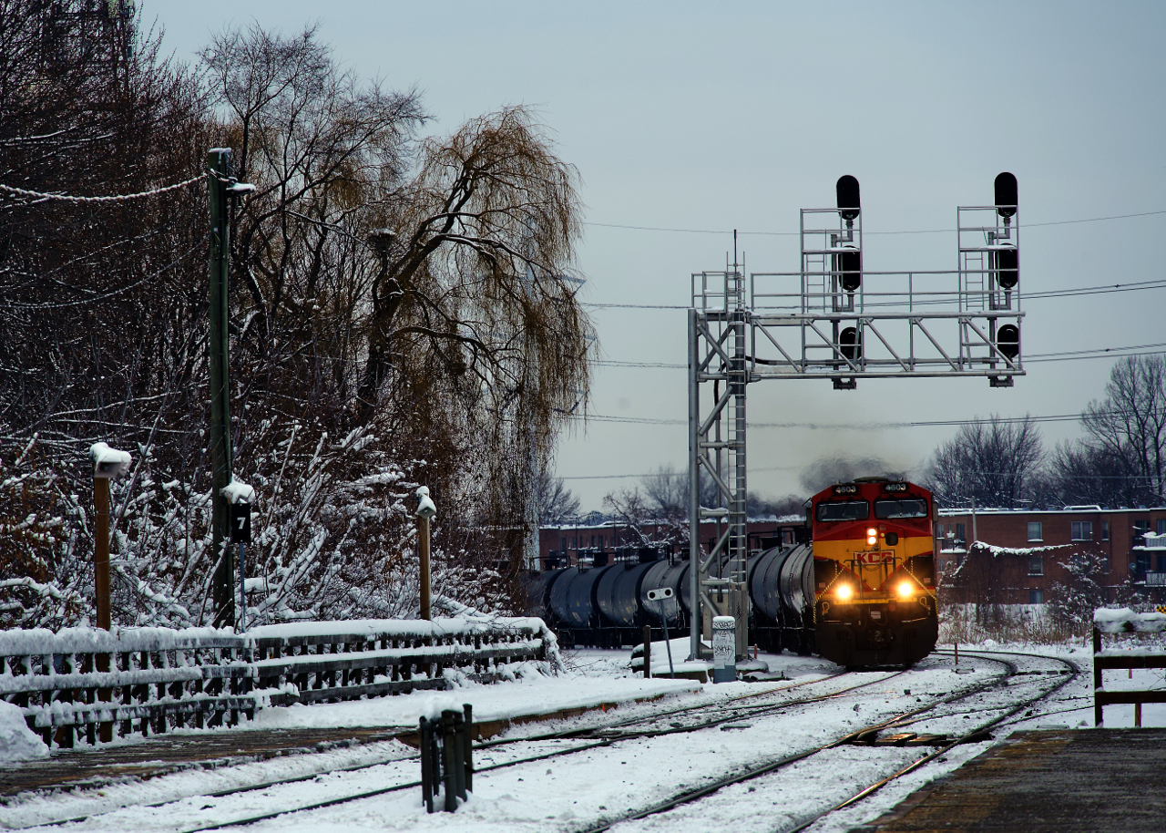 Railpictures.ca - Michael Berry Photo: Ethanol train CPKC 528 is about to pass Lasalle Station ...