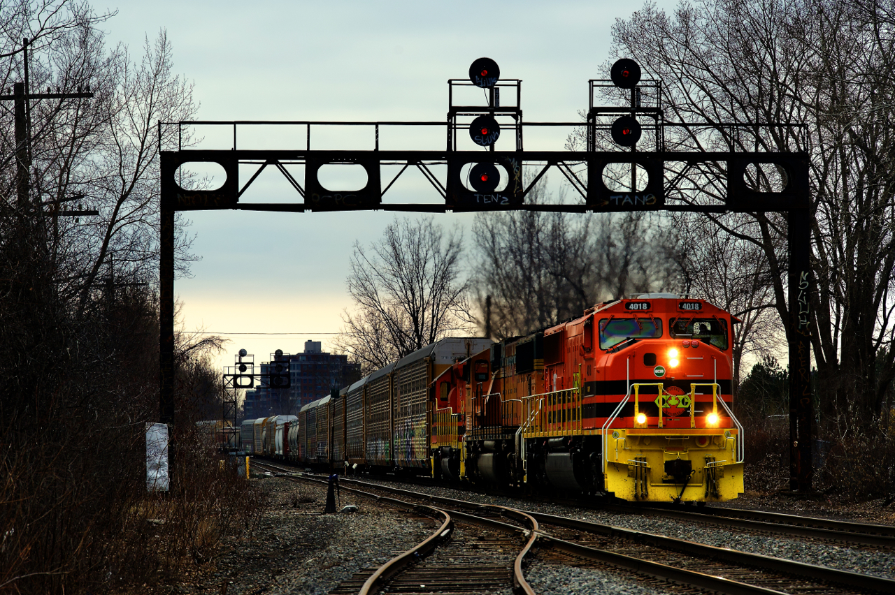Railpictures.ca - Michael Berry Photo: QG 502 with a repainted ex-BNSF SD70MAC leading heads ...