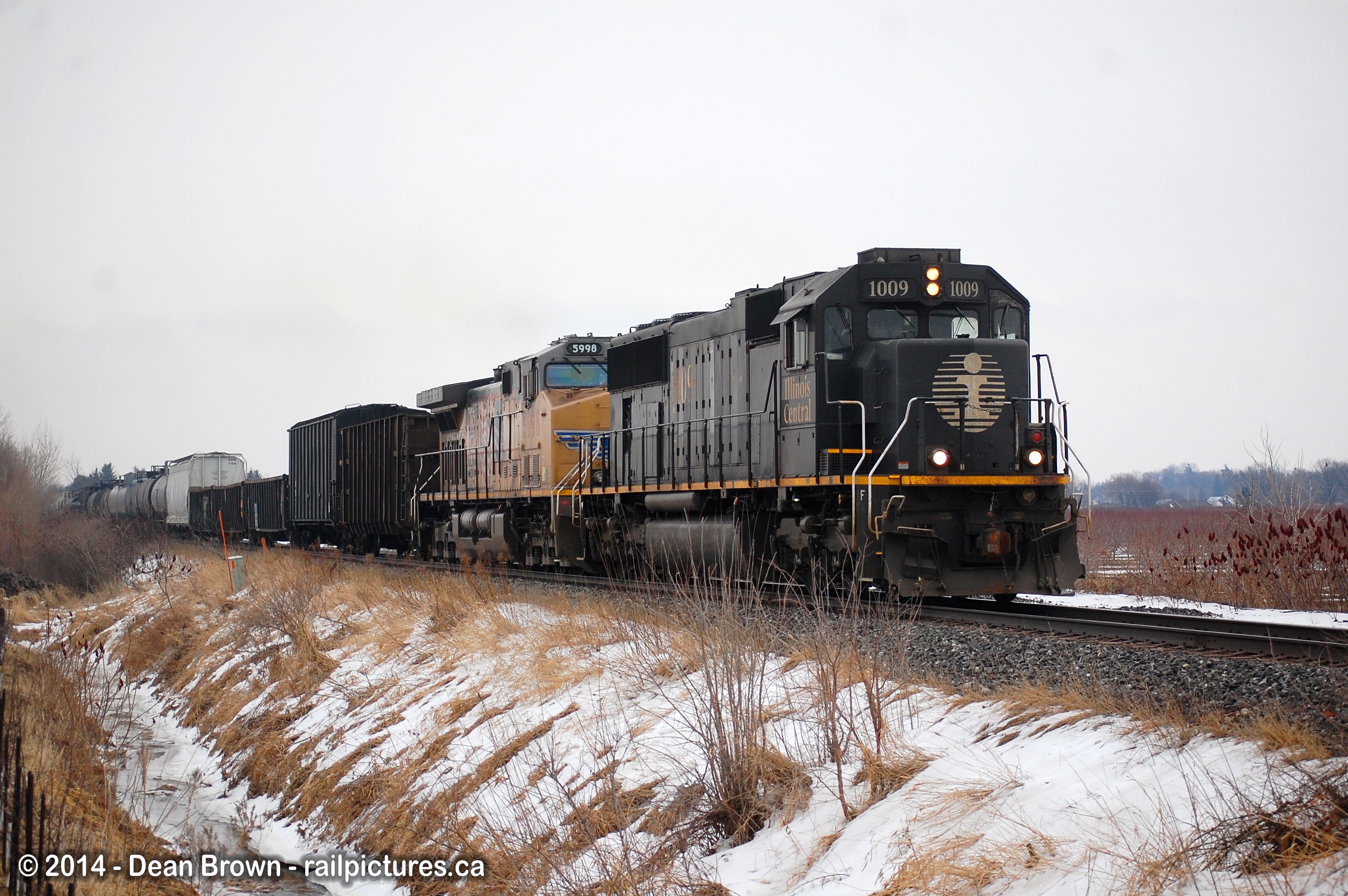 Railpictures.ca - Dean Brown Photo: CN 331 with IC SD70 1009 and UP AC4400CW 5998 through ...