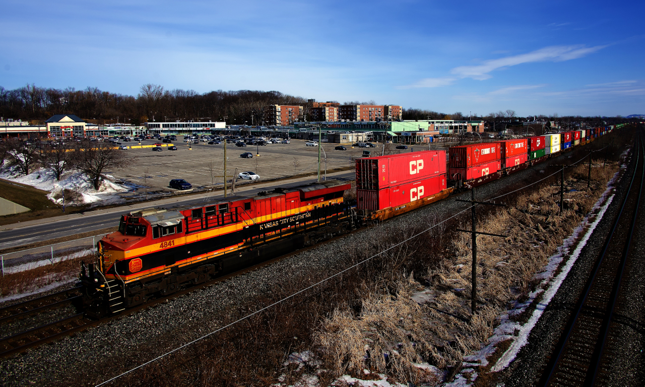 Railpictures.ca - Michael Berry Photo: A CPKC 112 with 442 axles passes through Pointe-Claire ...