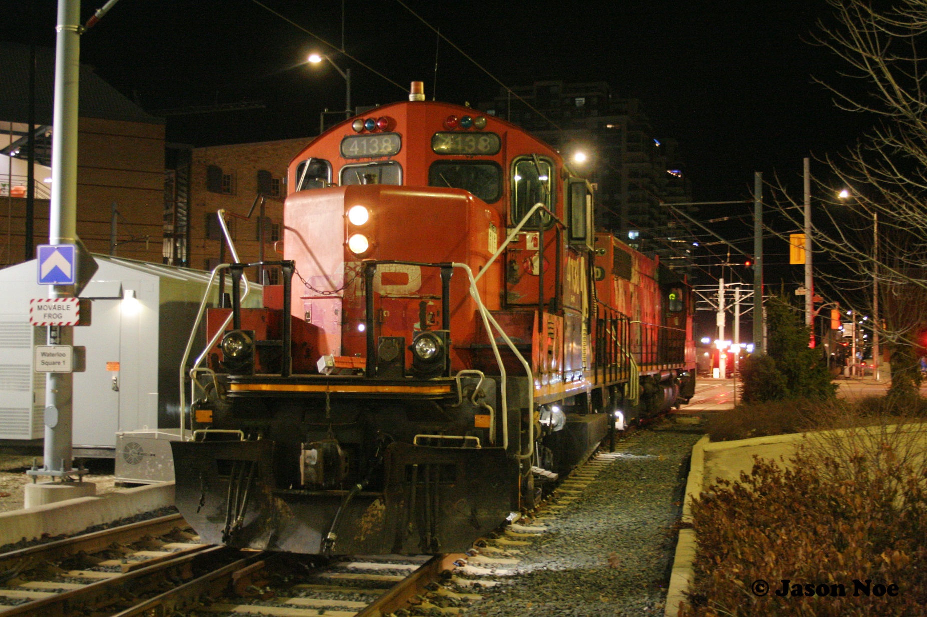 Railpictures.ca - Jason Noe Photo: CN L566 pauses to cross Erb and Caroline Streets in downtown ...