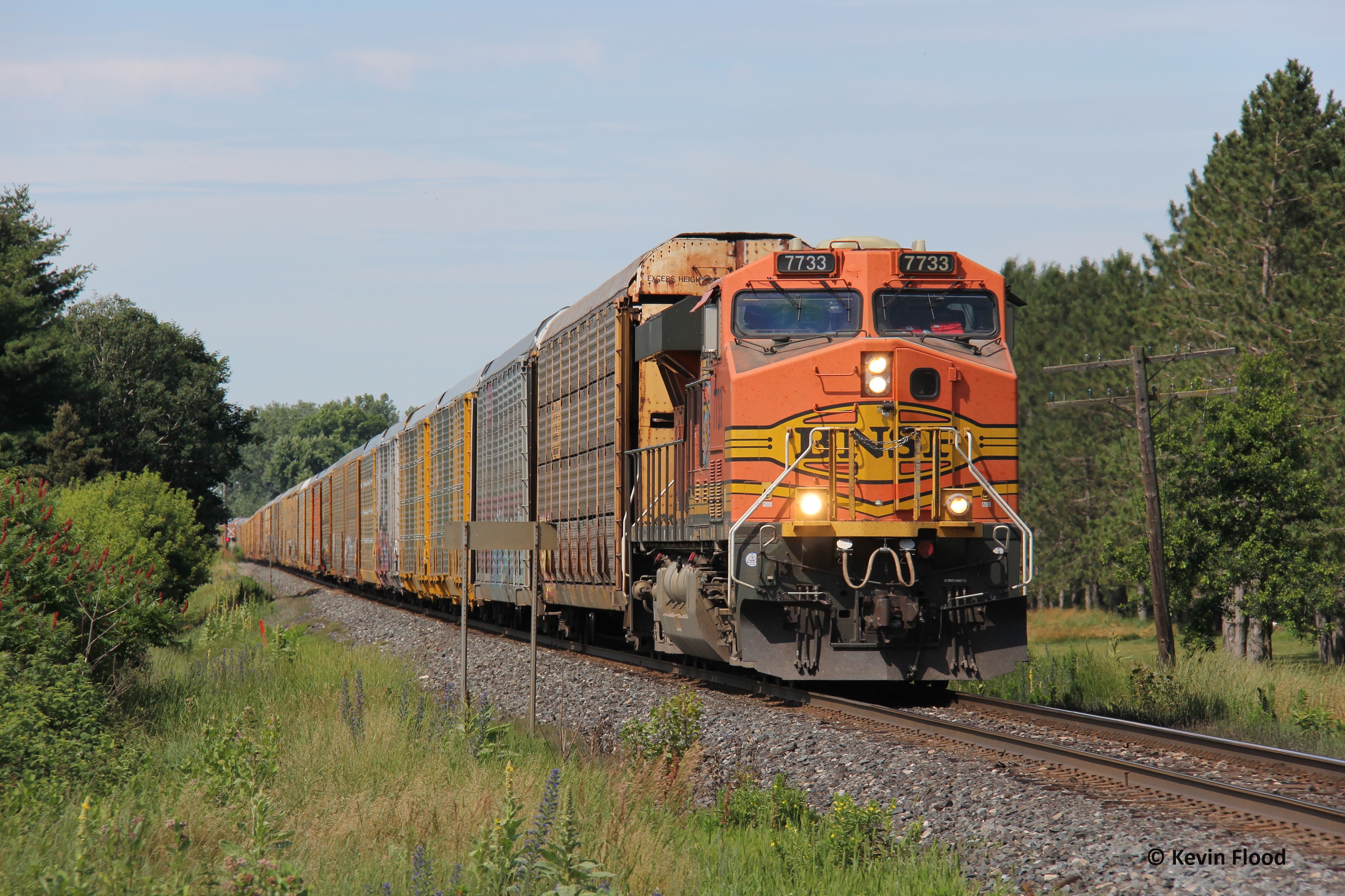 Railpictures.ca - Kevin Flood Photo: CPKC 734 heads east past Innerkip Highlands Golf Club with ...