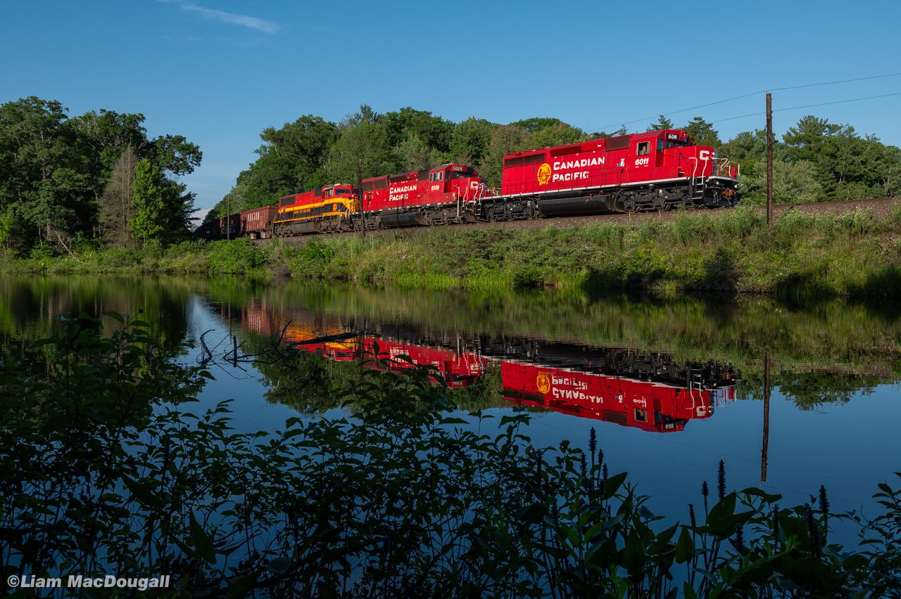Railpictures.ca - Liam MacDougall Photo: On a gorgeous July evening, CP 6011 leads loaded ...