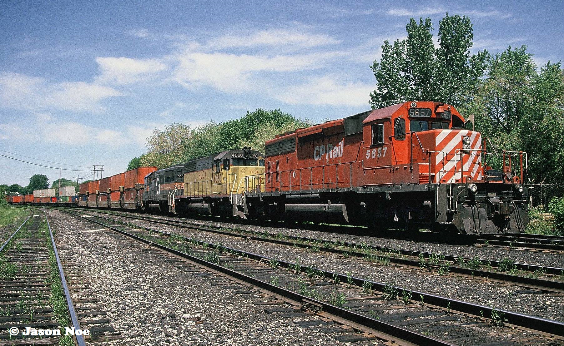 Railpictures.ca - Jason Noe Photo: An eastbound CP intermodal train is observed waiting for a ...