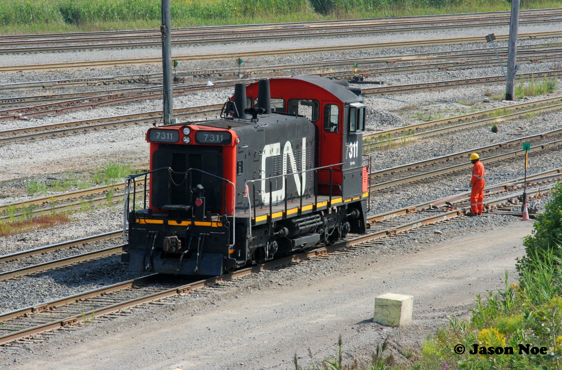 Railpictures.ca - Jason Noe Photo: CN SW1200RSm 7311 is viewed pausing near the Highway #7 ...
