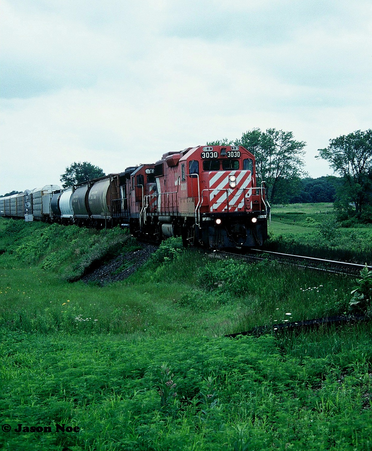 Railpictures.ca - Jason Noe Photo: An eastbound CP train is viewed approaching the Komoka ...