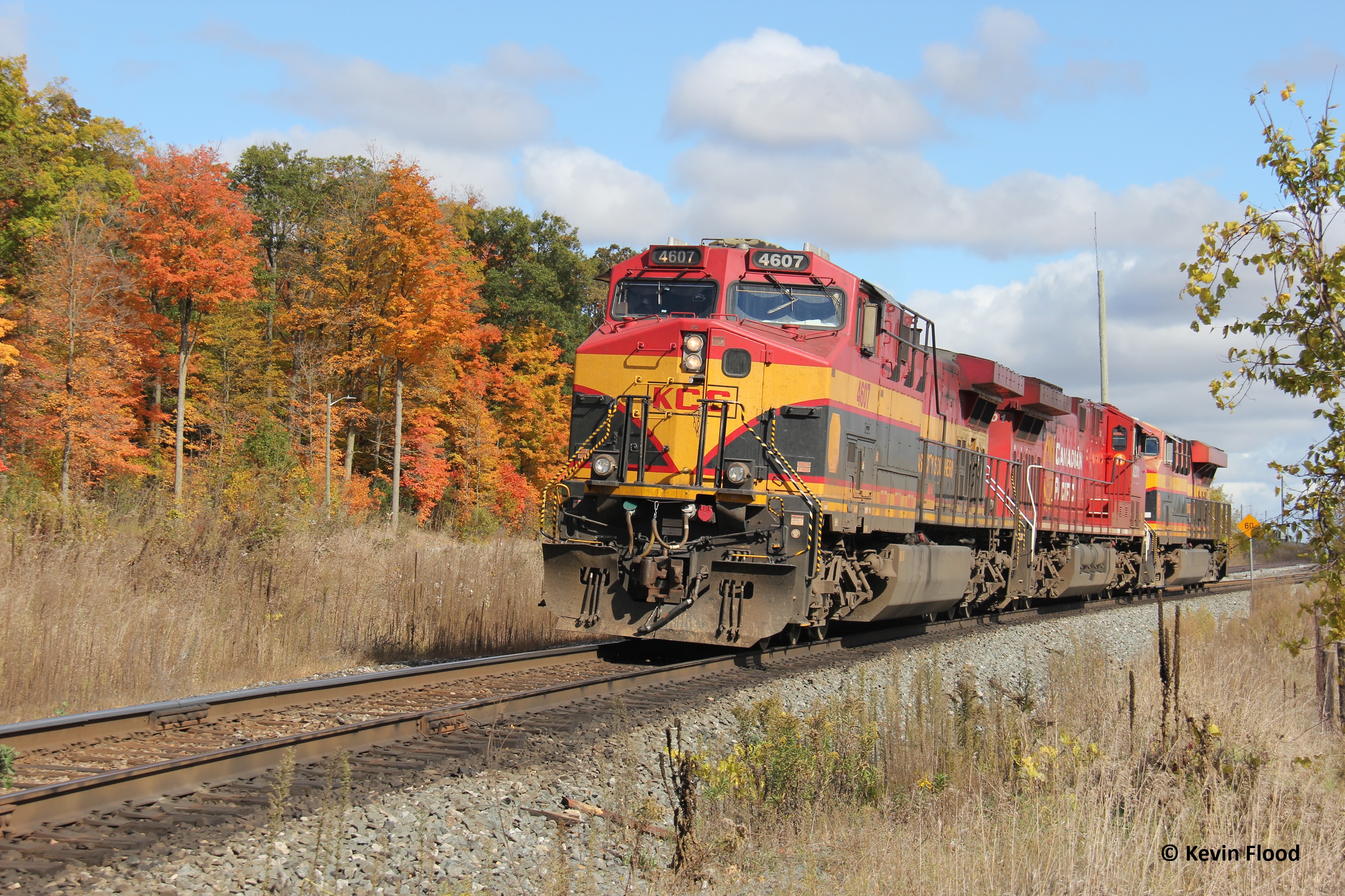 Railpictures.ca - Kevin Flood Photo: Power for CPKC 239 pulls ahead at Wolverton West with KCS ...