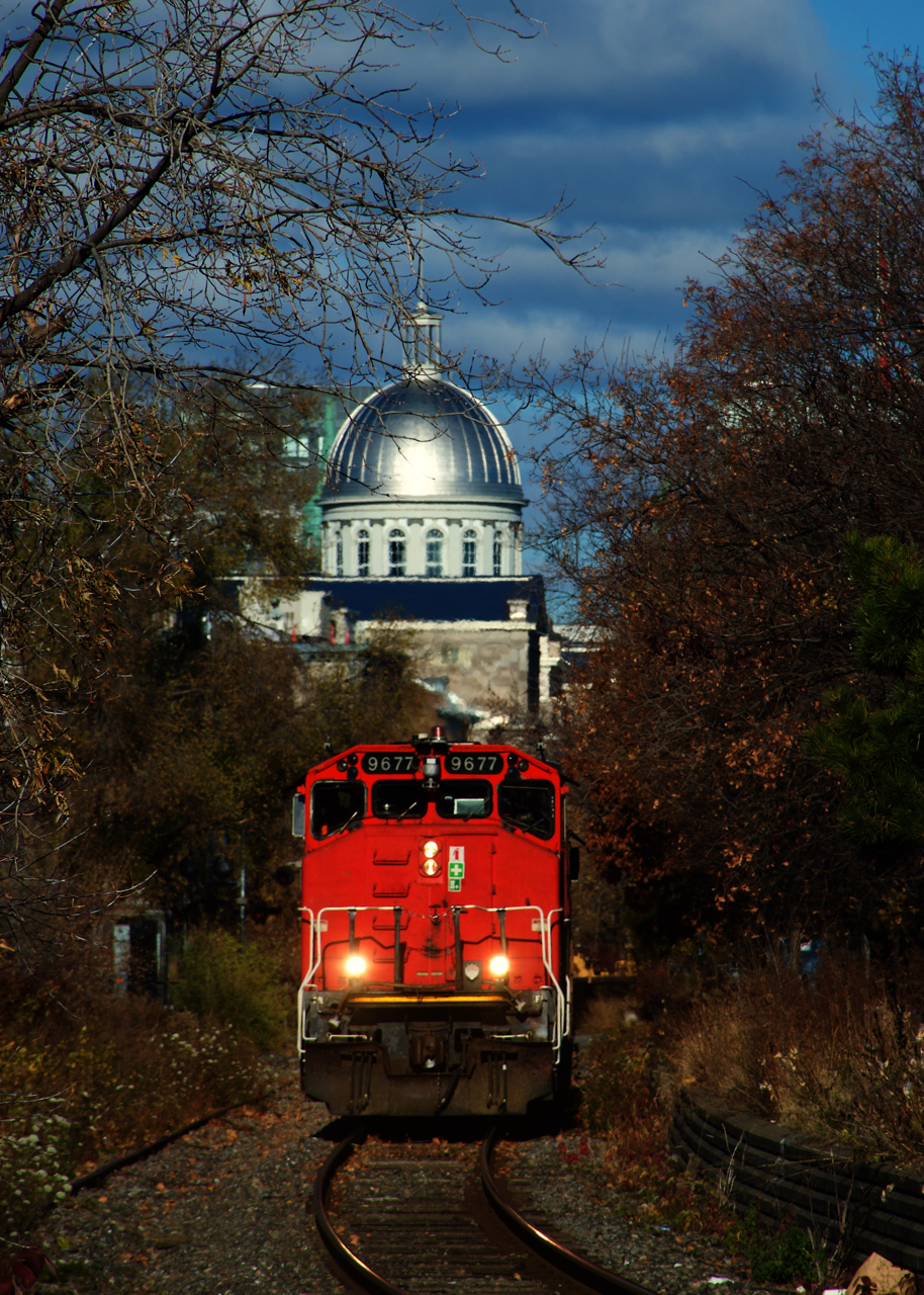 Railpictures.ca - Michael Berry Photo: The dome of Bonsecours Market looms above as CN 9677 ...