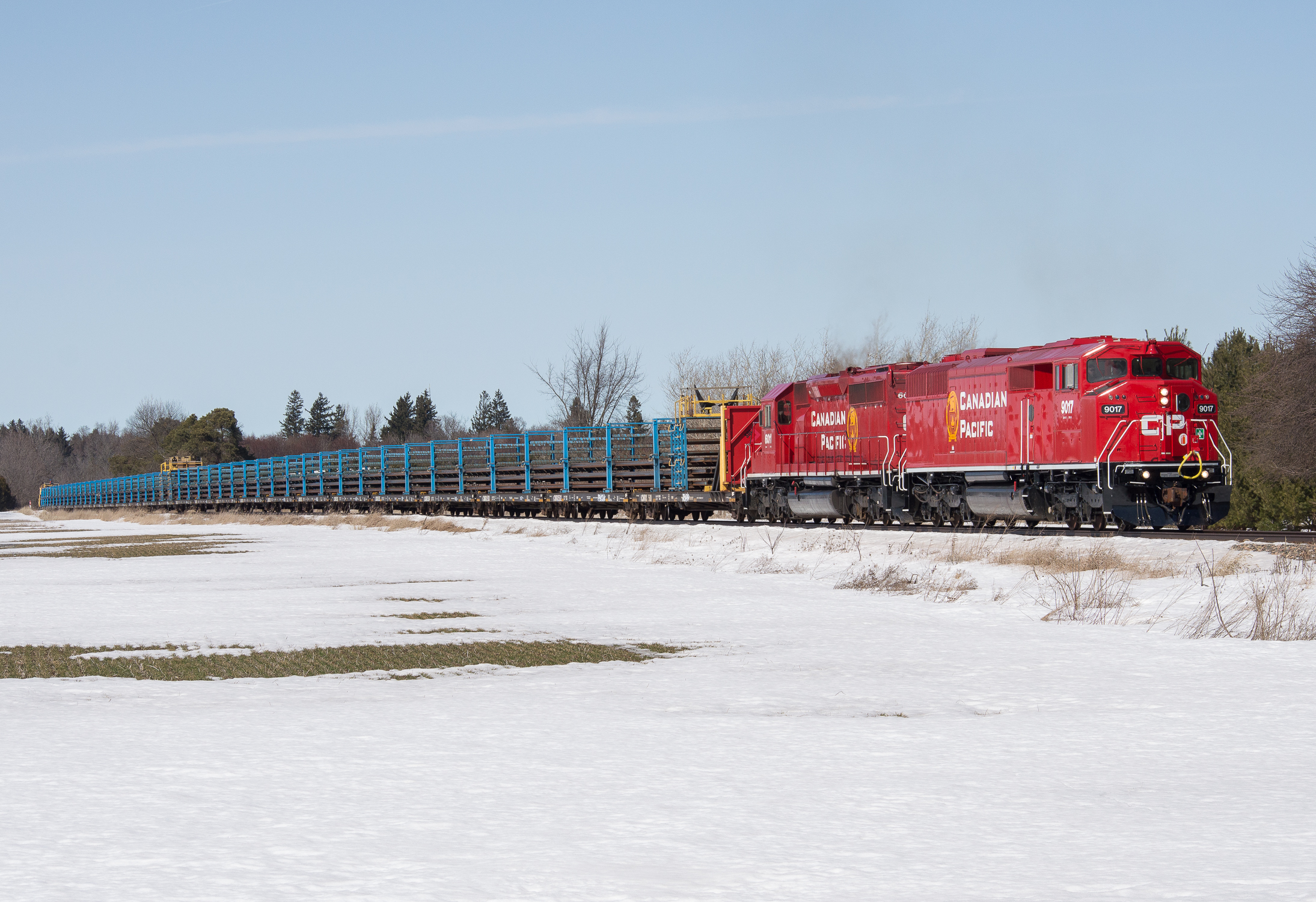 Railpictures.ca - Joseph Bishop Photo: CP 9017 and CP 6011 lead a loaded rail train down the ...
