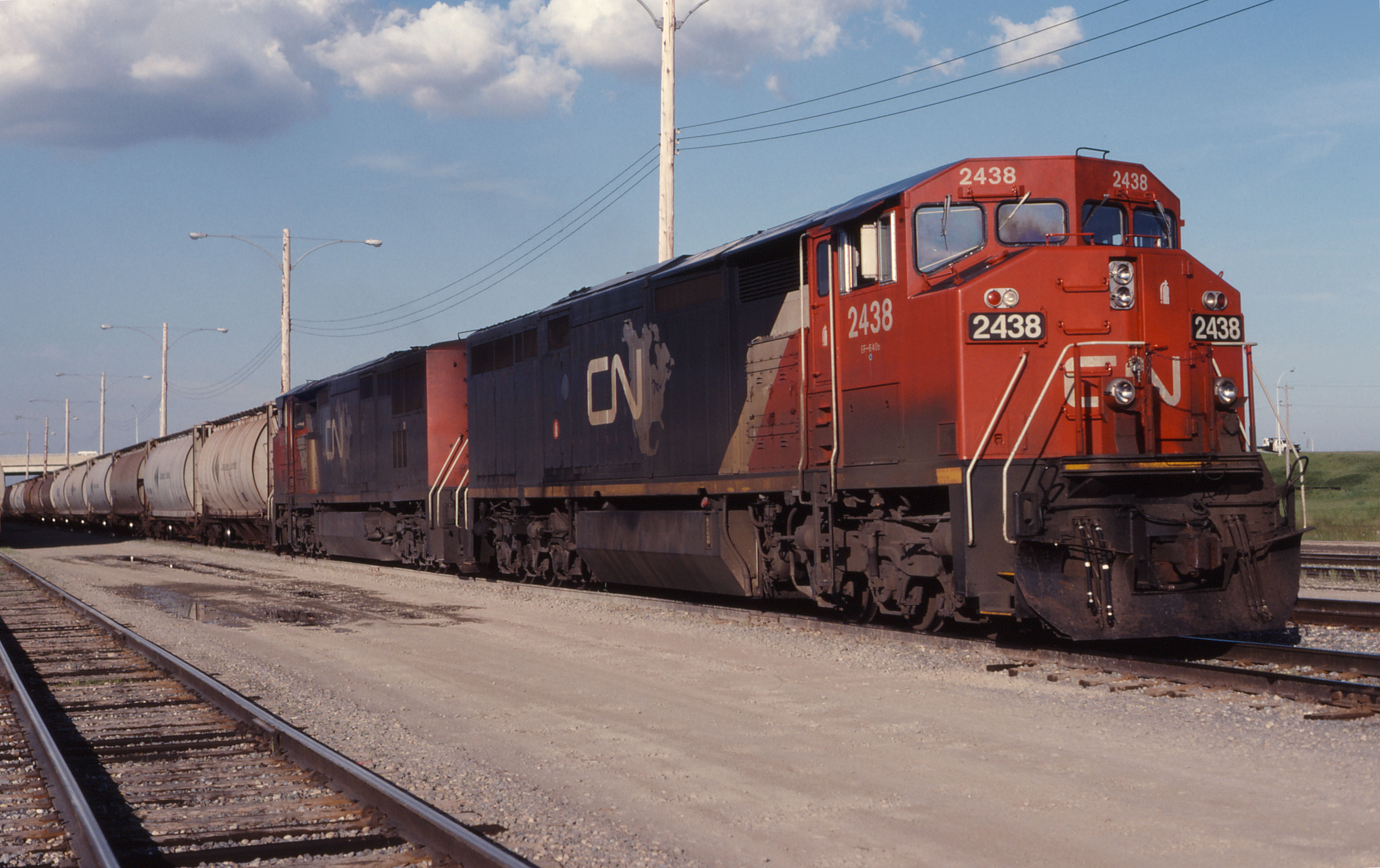 Railpictures.ca - John Eull Photo: A loaded potash train pauses at Bissell to change crews on a ...