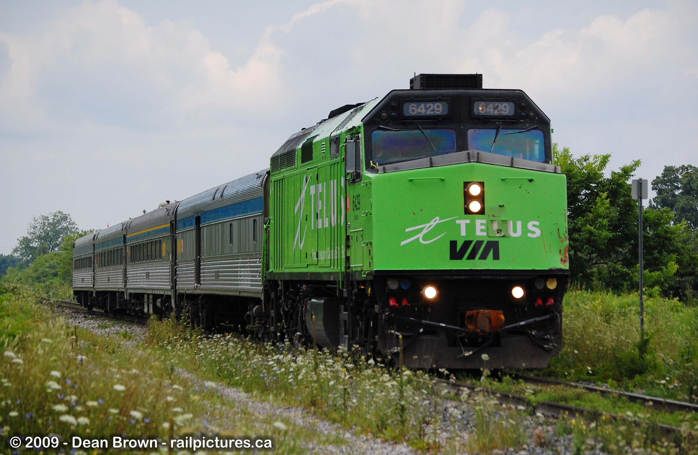 Railpictures.ca - Dean Brown Photo: VIA 93 with F40PH-2 6429 (Telus Wrap) on a Bike Train that ...