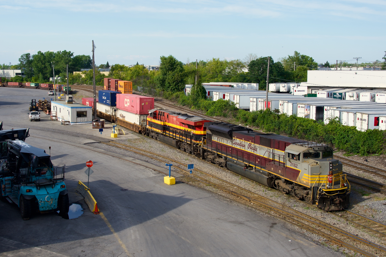 Railpictures.ca - Michael Berry Photo: CPKC 119 with CP 7012 & KCS 4770 is lifting intermodal ...