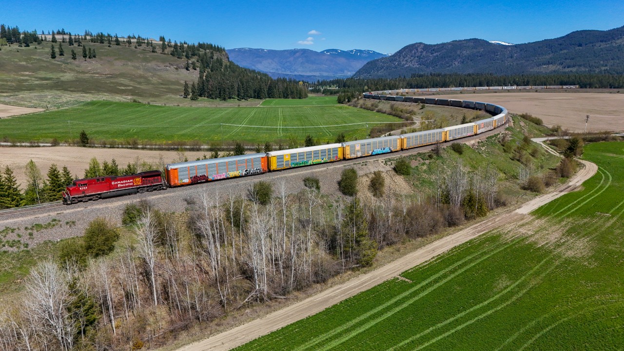 Railpictures.ca - Rob Eull Photo: CPKC 9-149-21 works its way through Notch Hill with 46 autos ...