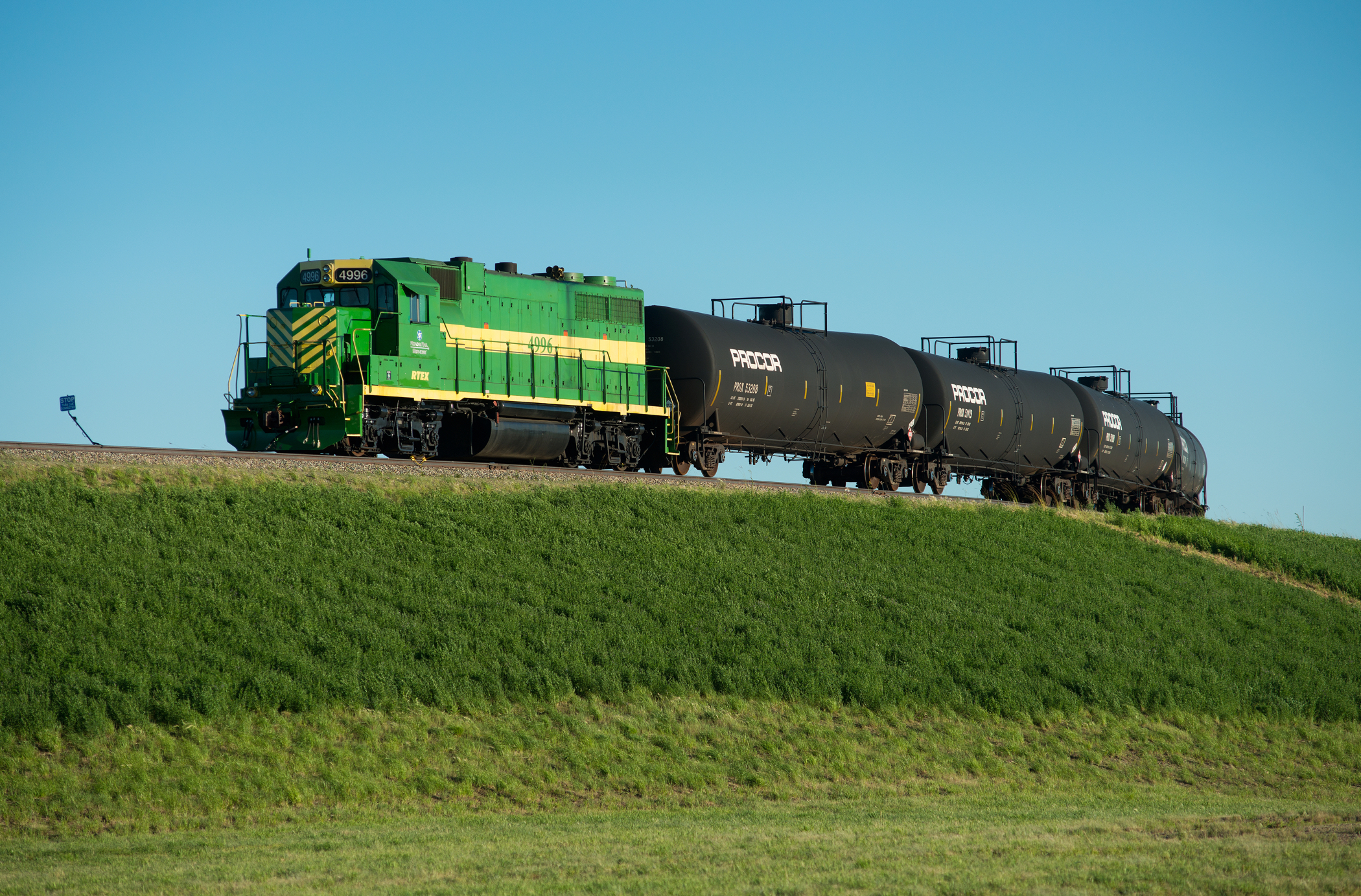 Railpictures.ca - Matt Watson Photo: RTEX 4996 blends in well with it’s ...