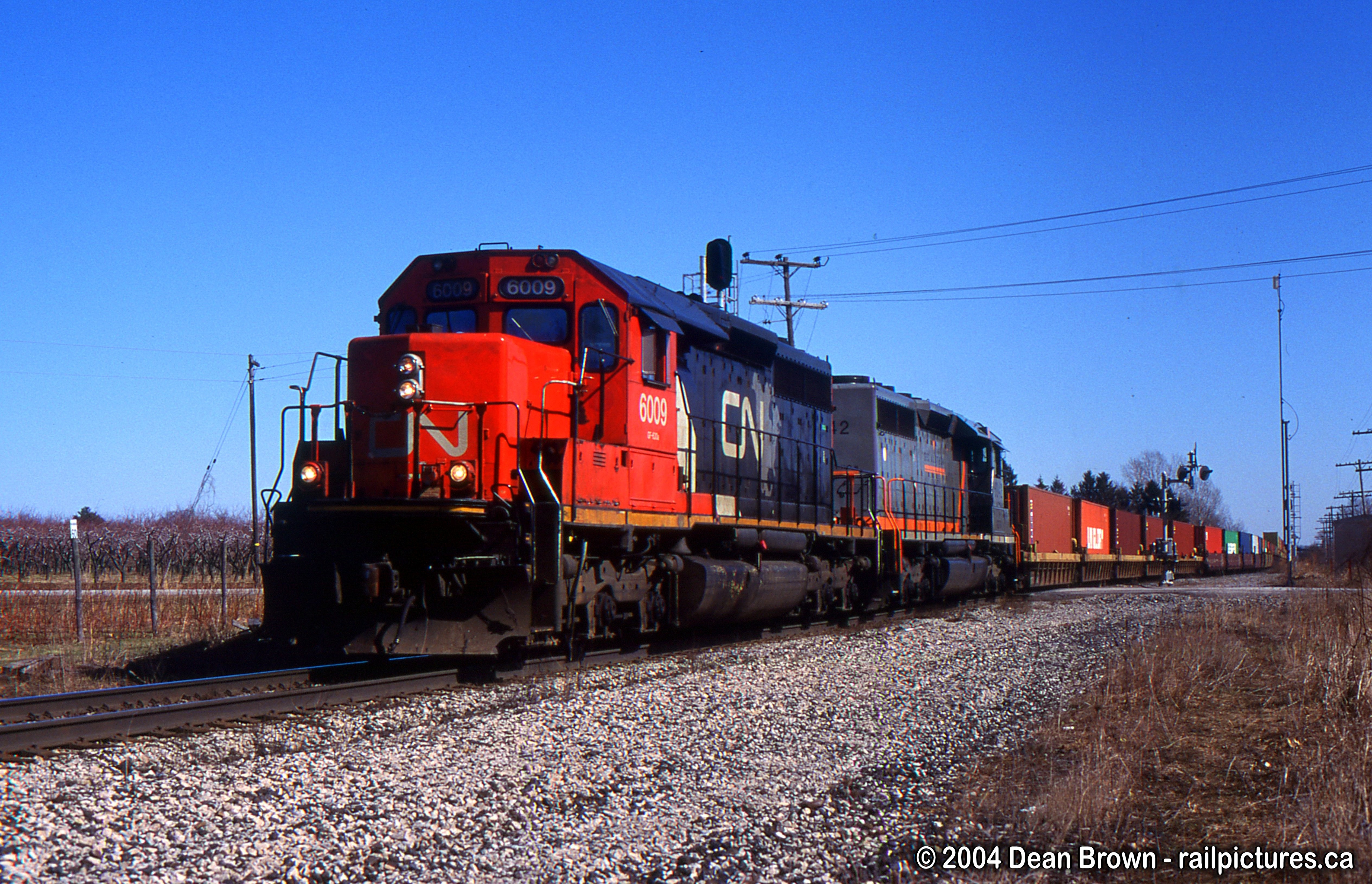 Railpictures.ca - Dean Brown Photo: CN 338 with CN 6009 West crosses ...