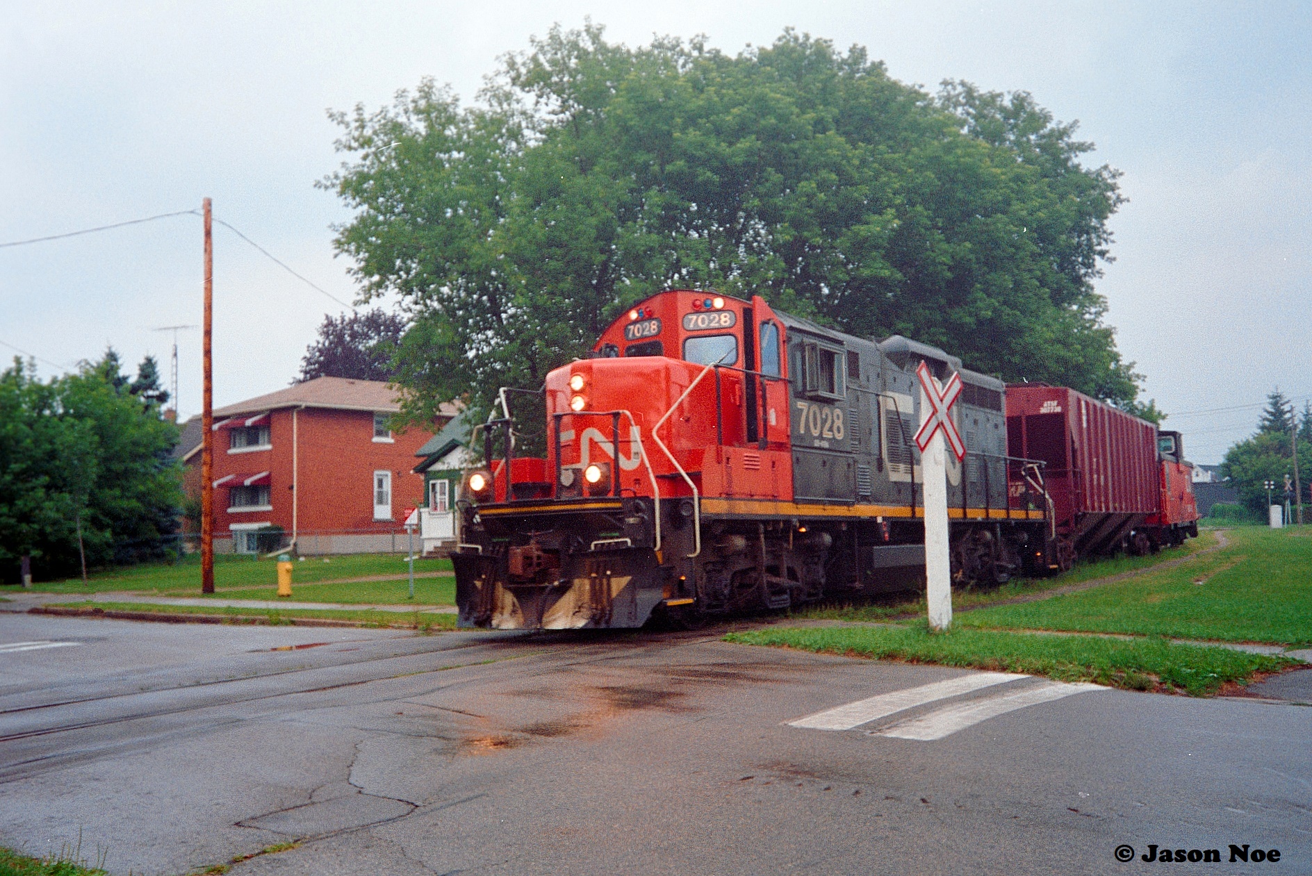 Railpictures.ca - Jason Noe Photo: Not long after a summer downpour ...